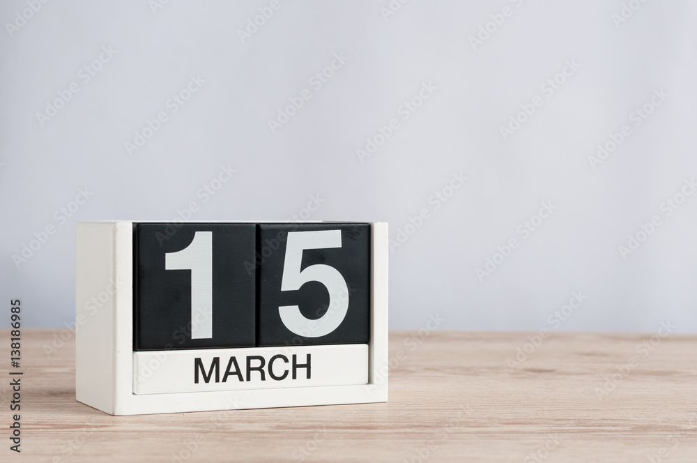 March 15th. Day 15 of month, wooden calendar on light background ...