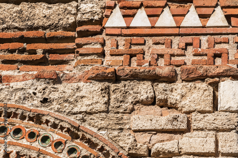 Symbols of old wall of church Stock Photo | Adobe Stock