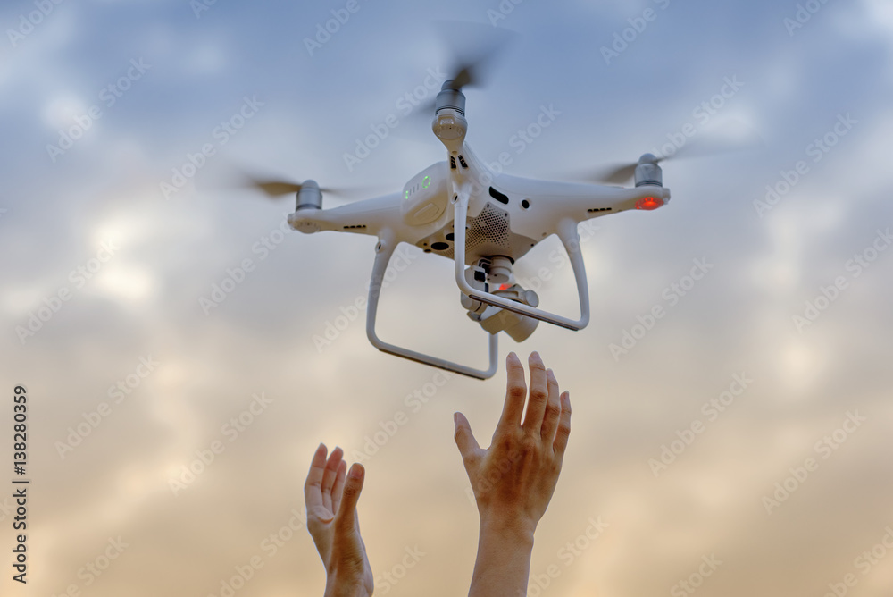 hands releasse/holding drone take off to the sky Stock-Foto | Adobe Stock