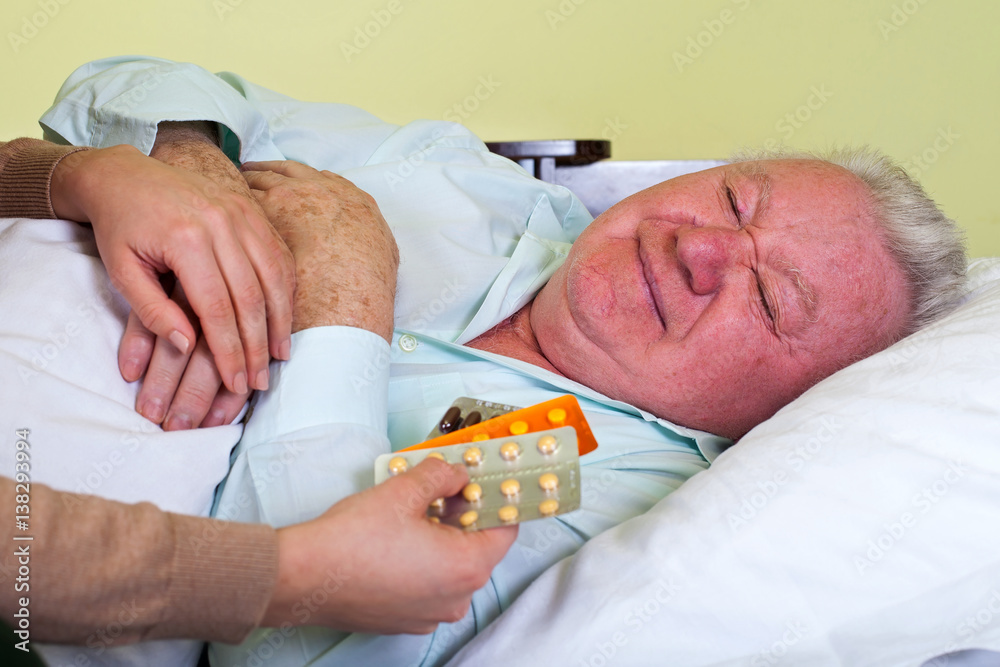Elderly man receiving medication Stock Photo | Adobe Stock
