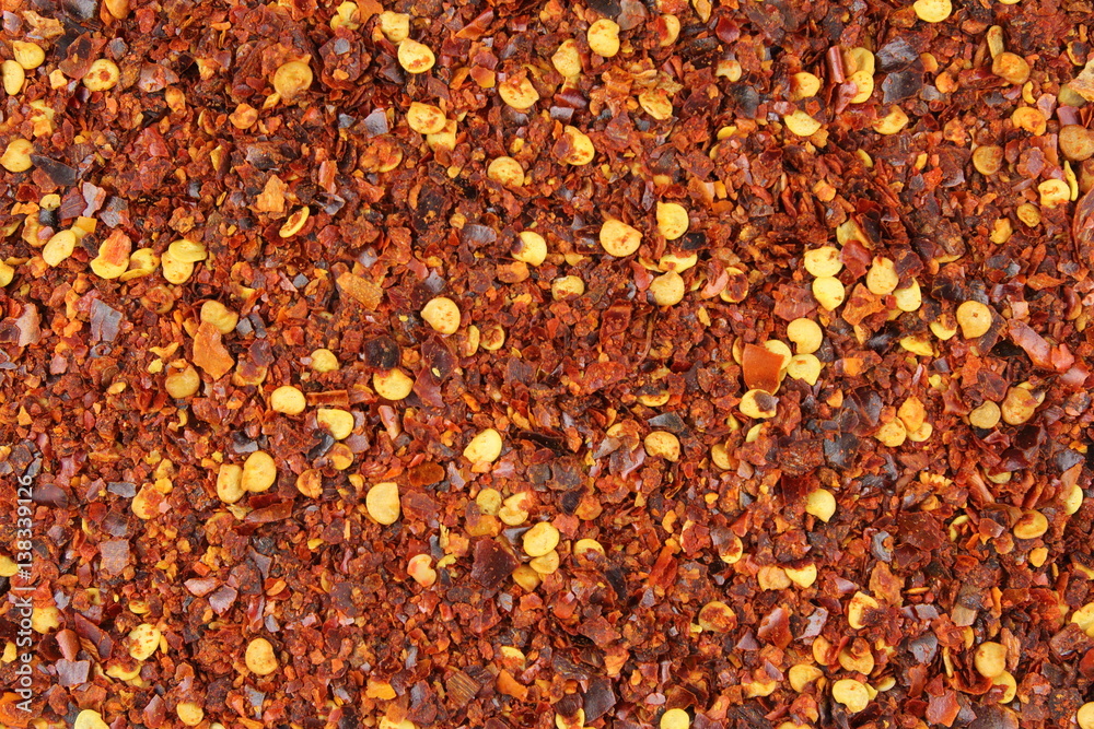 crushed red pepper flakes closeup food background texture Stock Photo ...