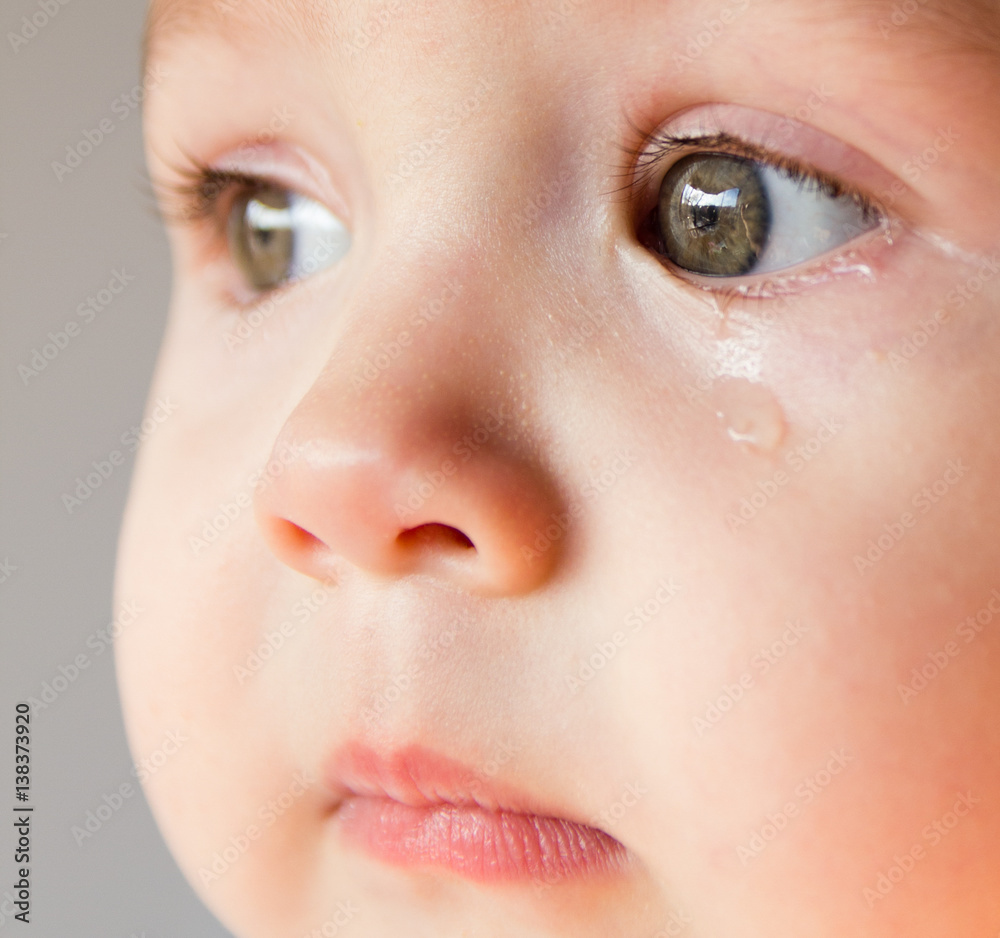Sad face baby. A tear on the face Stock Photo | Adobe Stock