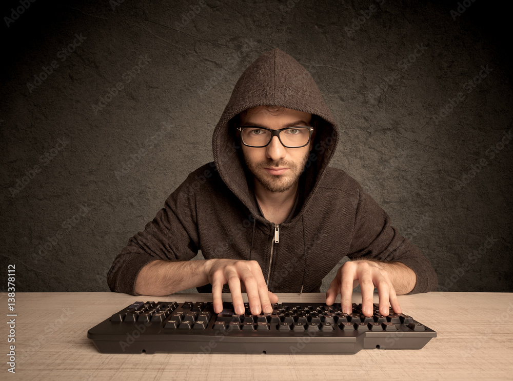 Computer geek typing on keyboard Stock Photo | Adobe Stock