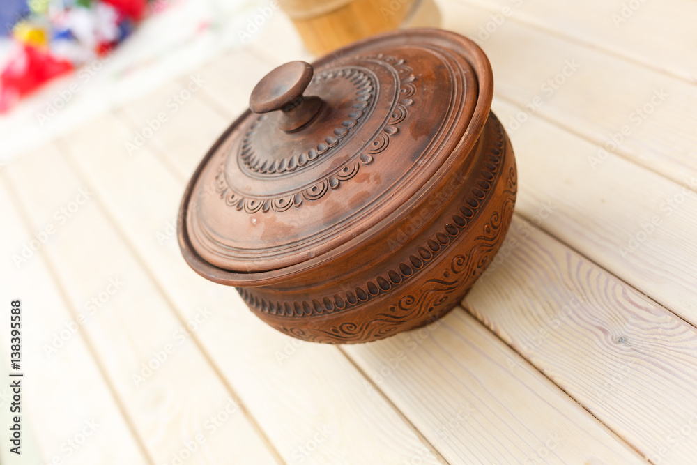 Vintage earthen pot Kooja of Kerala, India for storing water. Due to ...