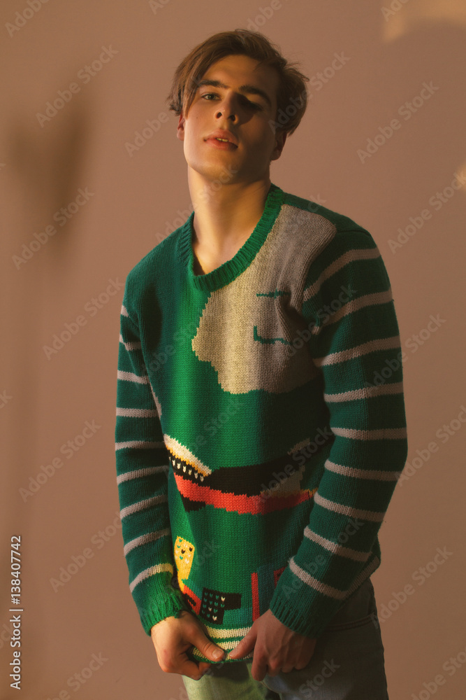Cute guy in hipster clothes 90s posing in studio Stock Photo | Adobe Stock