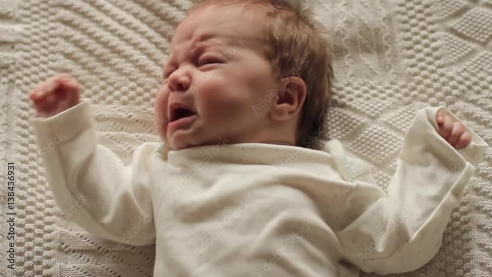 Little Baby is Crying, Her Mother Calms Stock Video | Adobe Stock