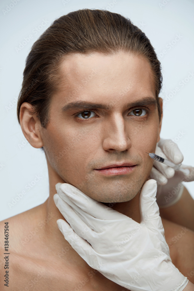 Male Beauty Injection. Handsome Man Receiving Facial Injections Stock ...