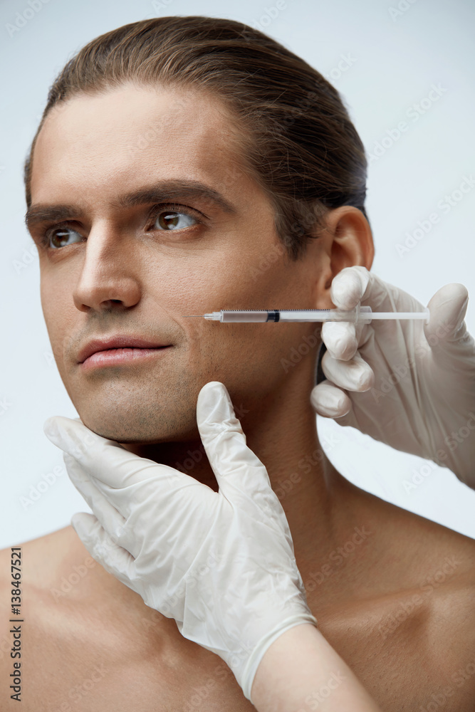 Male Beauty Injection. Handsome Man Receiving Facial Injections Stock ...