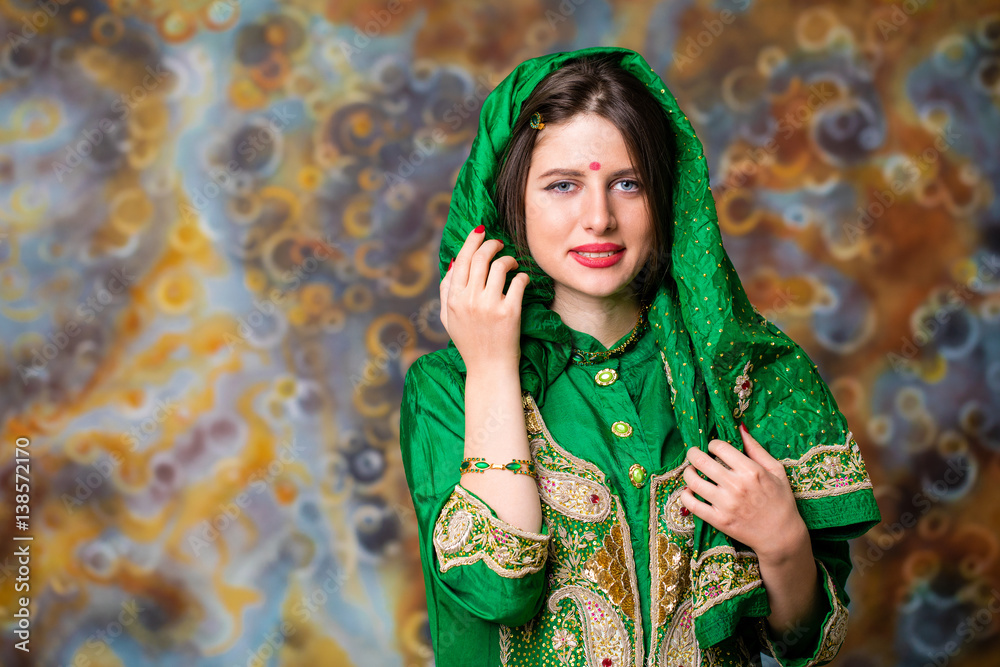 Portrait of beautiful eastern woman in green sari Stock Photo | Adobe Stock