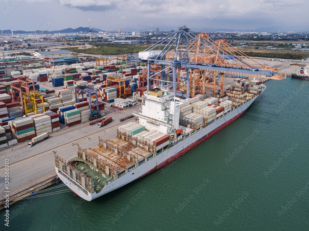 commercial container vessel in operation of loading and discharging ...