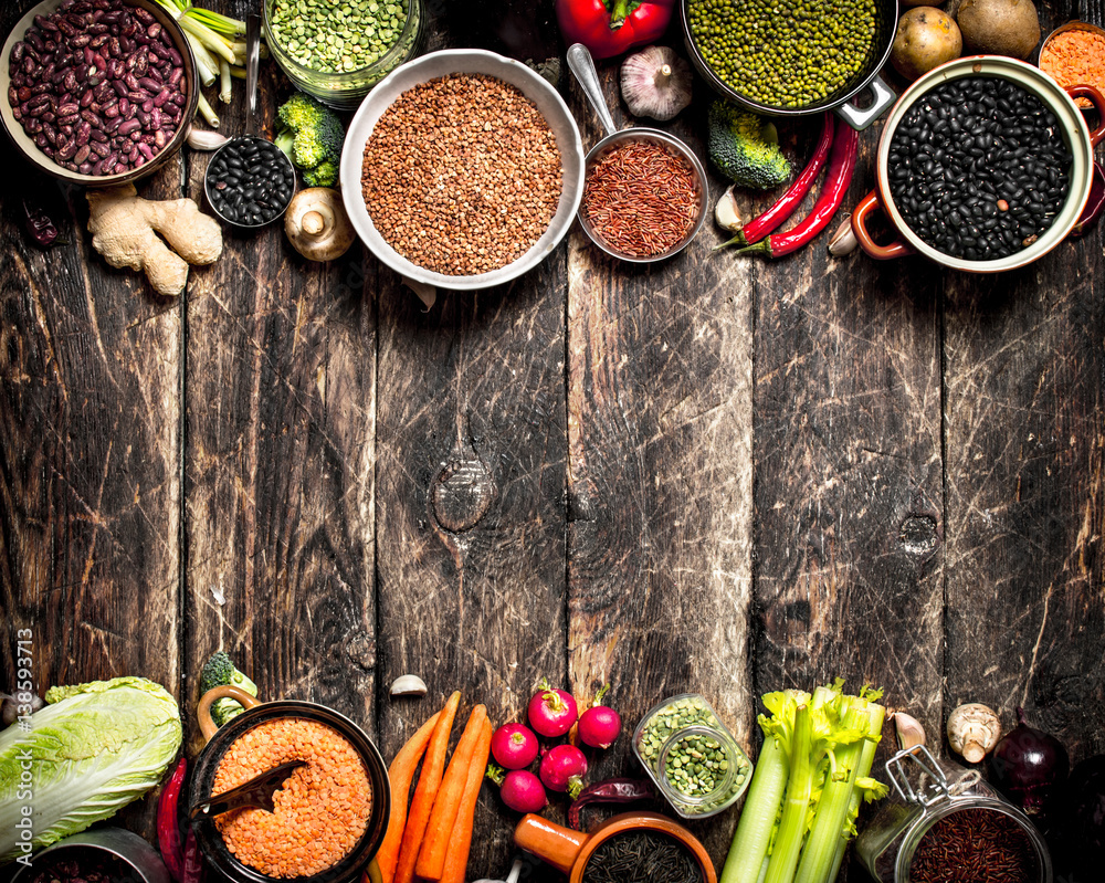 Organic Food. A variety of beans with fresh vegetables and spices. On ...