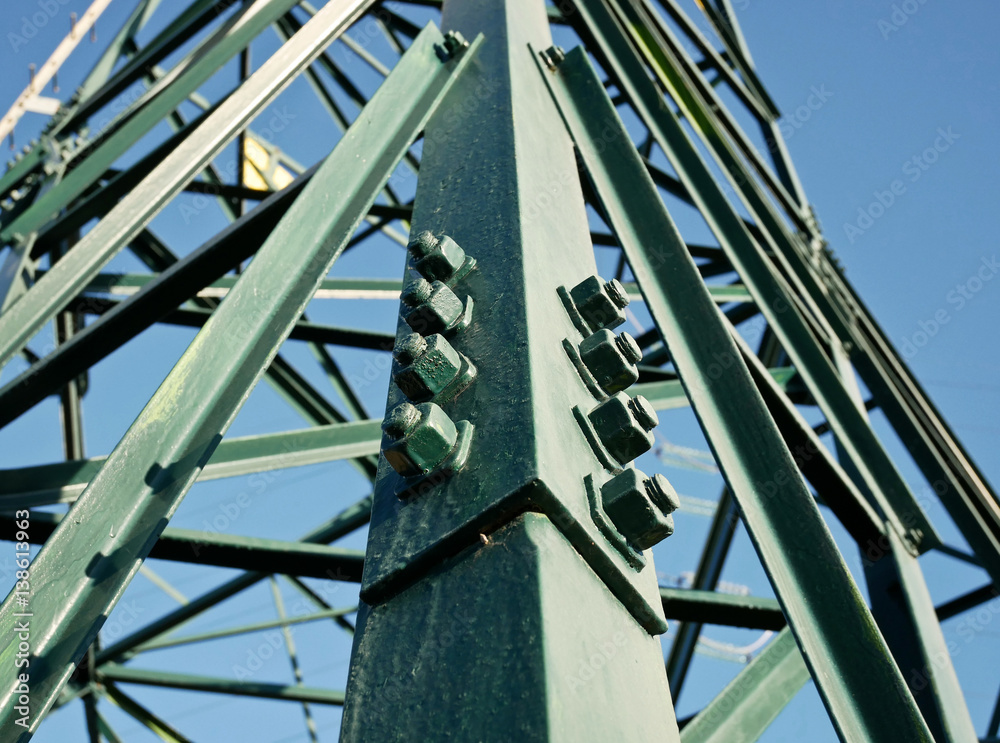 Foto Stock Detail of the electric pylon green with bolts. | Adobe Stock