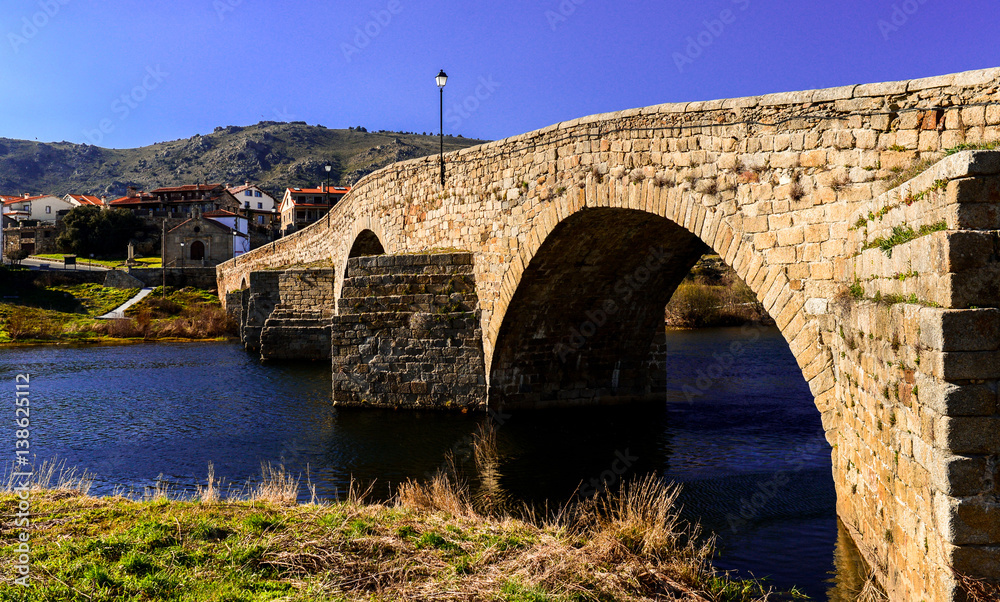 Roman bridge of 125 meters long built on the river Tormes in the town ...
