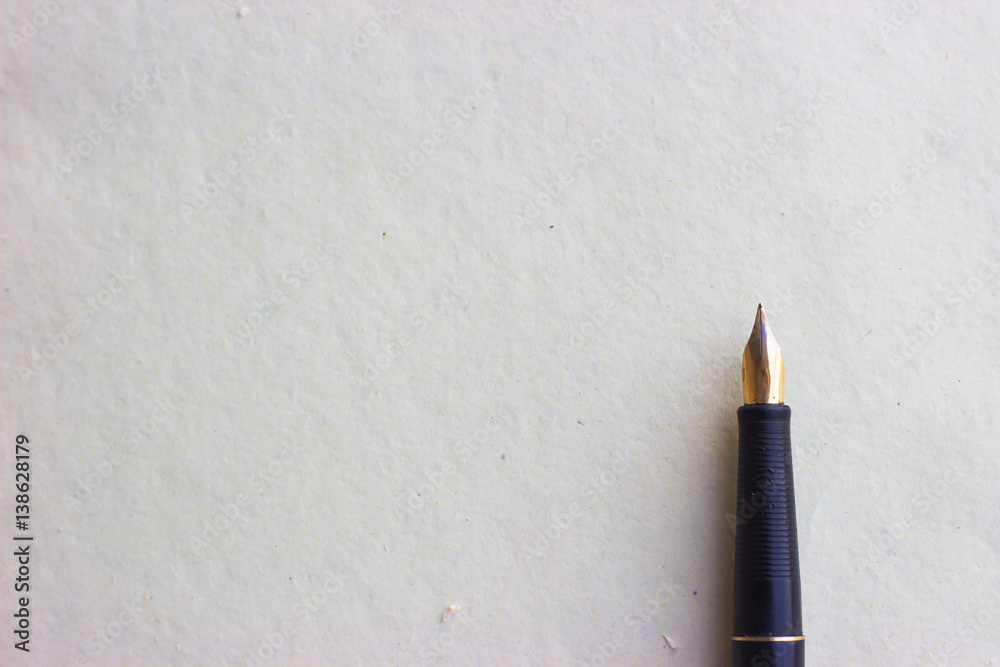 Old fountain pen on aged paper Stock Photo | Adobe Stock