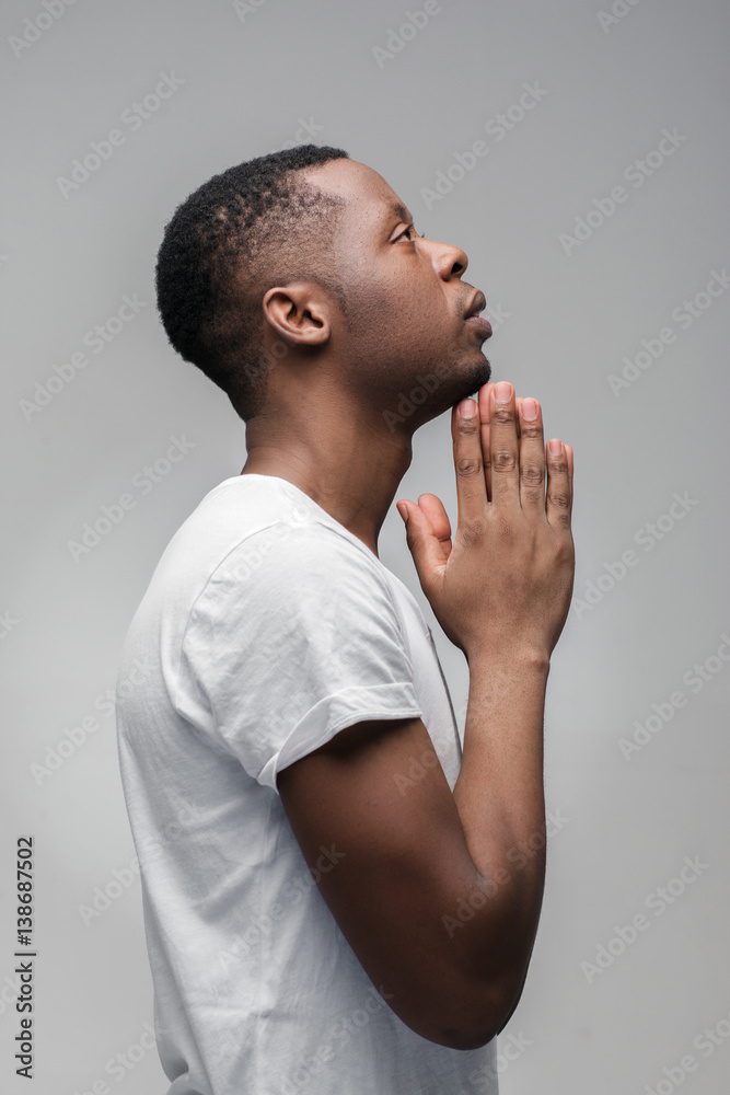 Praying african american man hoping for better. Asking God for good ...