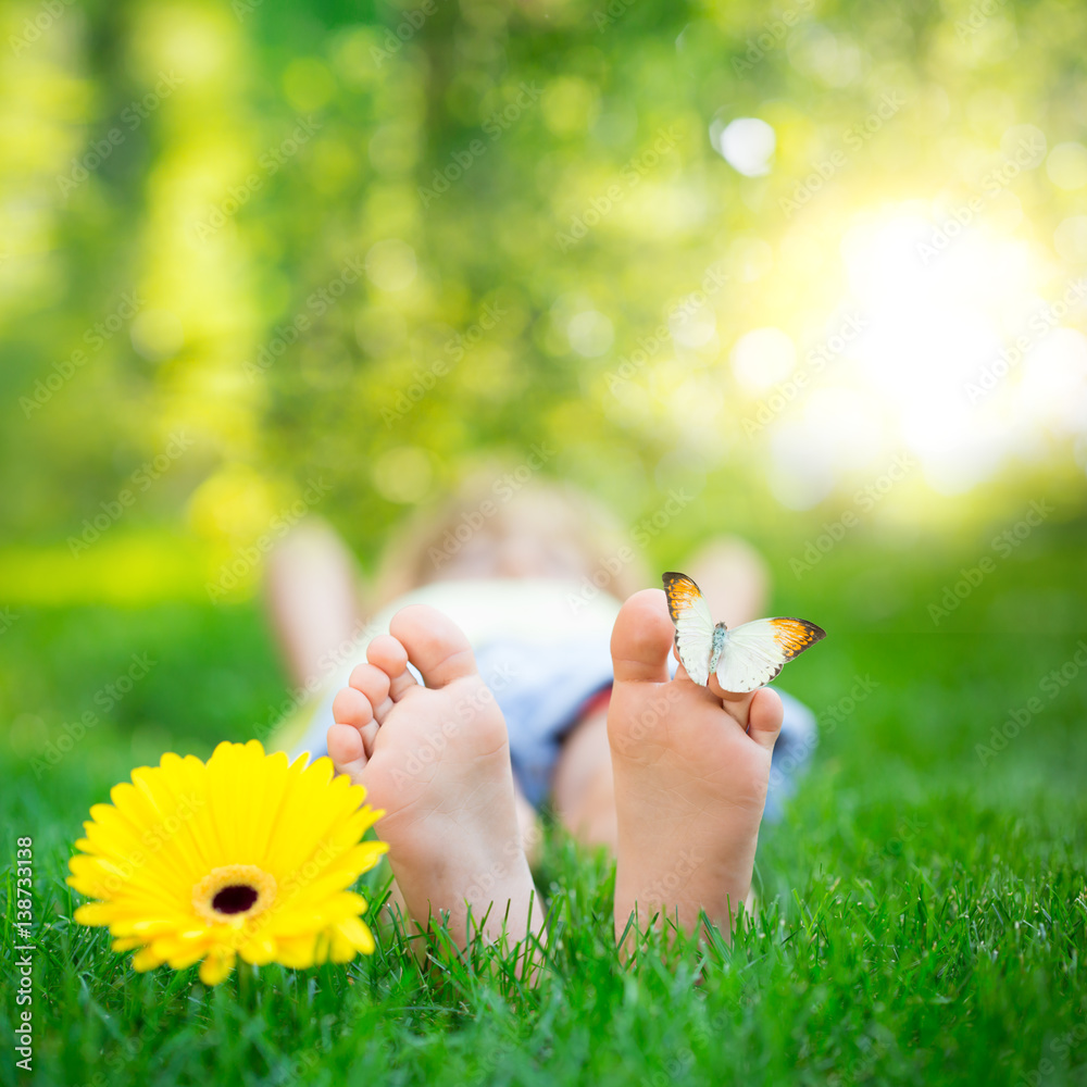 Happy child in spring park Stock Photo | Adobe Stock