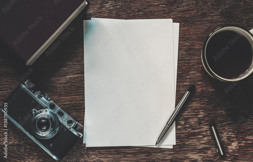 Sheets of paper, pen and retro camera on table. Writing a letter Stock ...