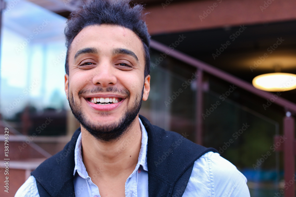 Portrait of cheerful young male Muslim. Man smiling and posing a Stock ...