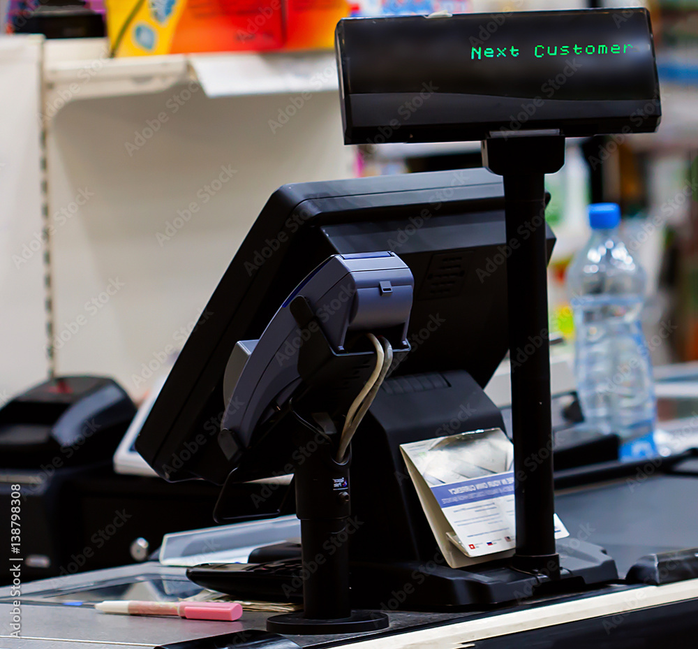 Empty cash desk with terminal in supermarket Stock Photo | Adobe Stock