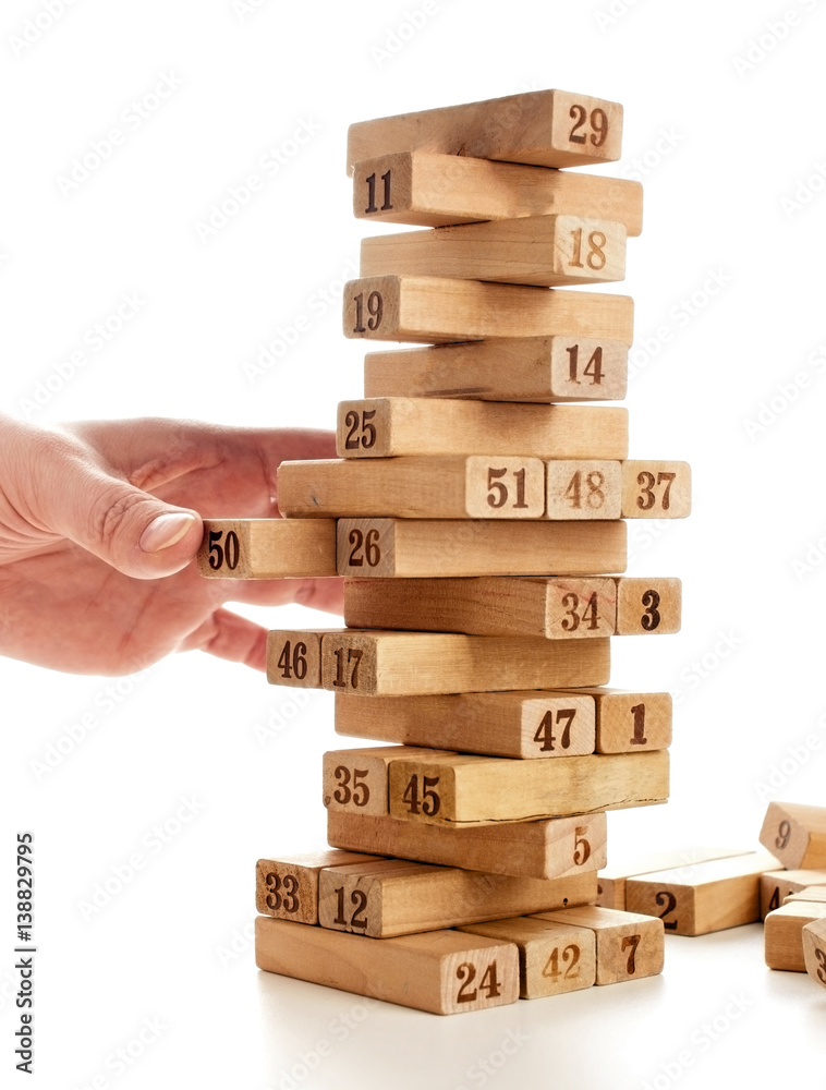 Blocks of game jenga isolated on white background. Vertical tower whole ...