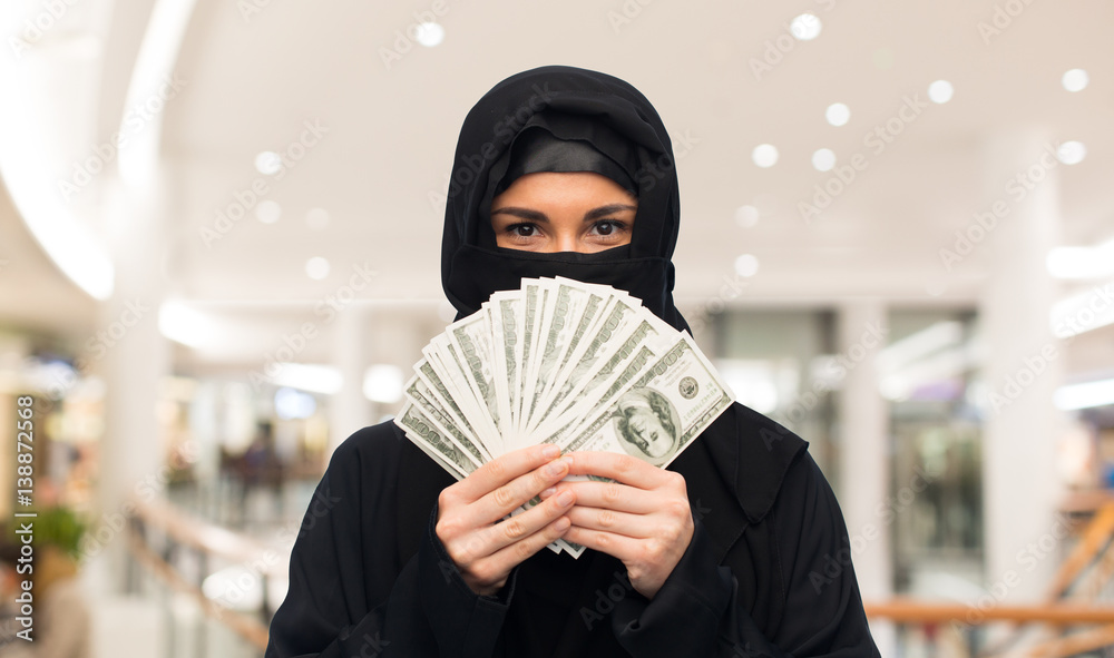 muslim woman in hijab with money over white Stock Photo | Adobe Stock