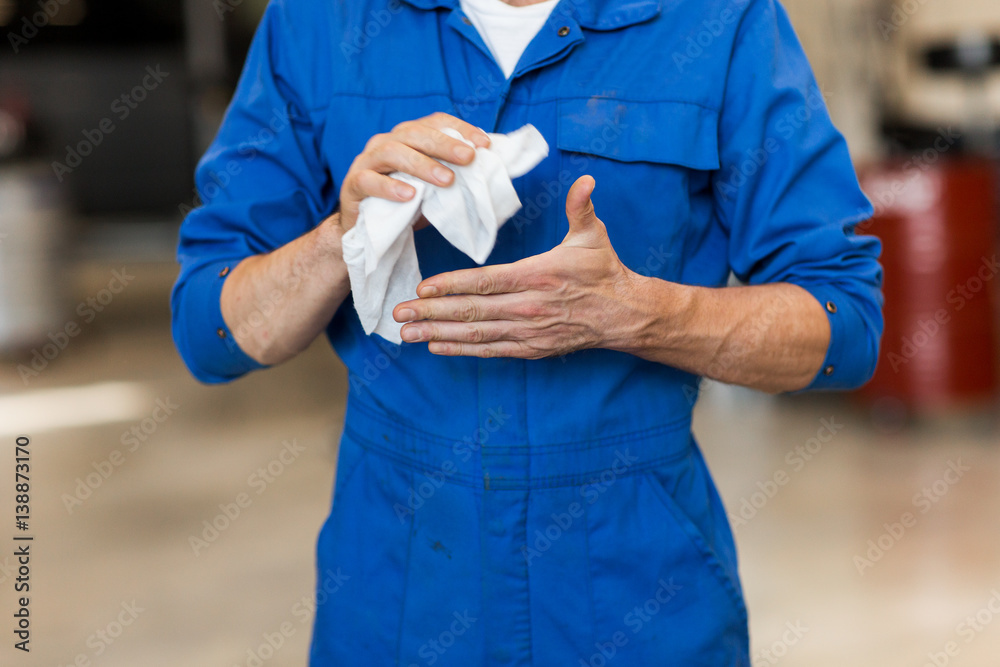 mechanic man or smith with wipe at car workshop Stock Photo | Adobe Stock