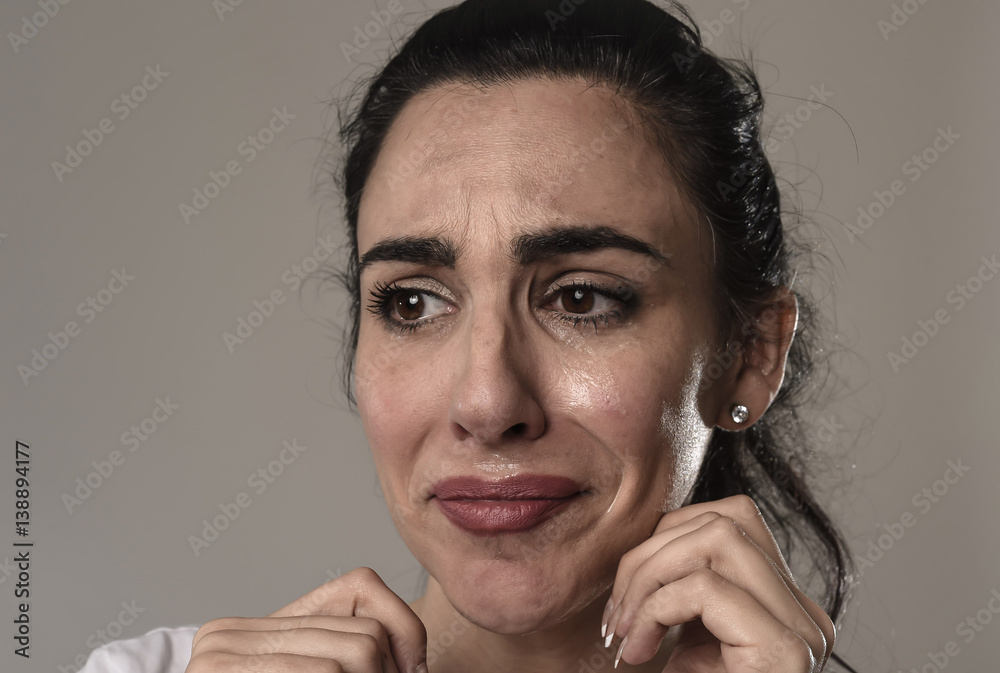 beautiful and sad woman crying desperate and depressed with tears on ...