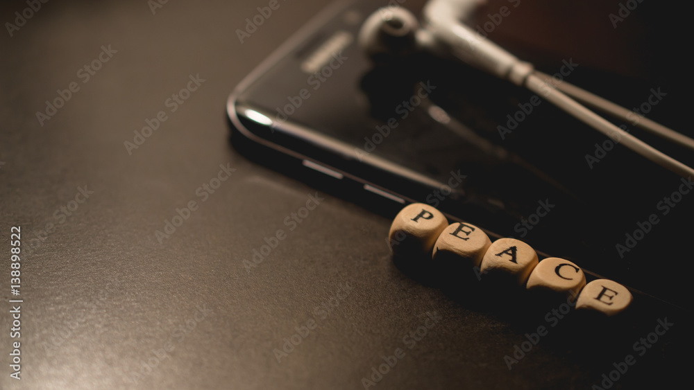 Time to Turn off of smartphone and Peaceon dark word background and ...