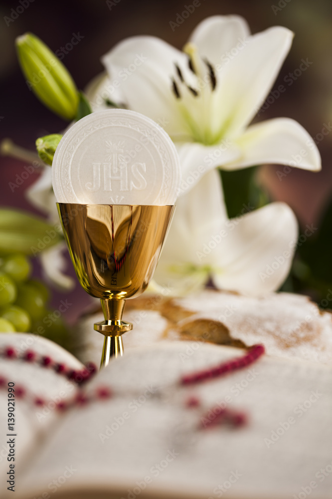 Holy communion a golden chalice with grapes and bread wafers Stock ...