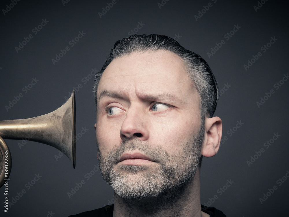 Man with trumpet Stock Photo | Adobe Stock