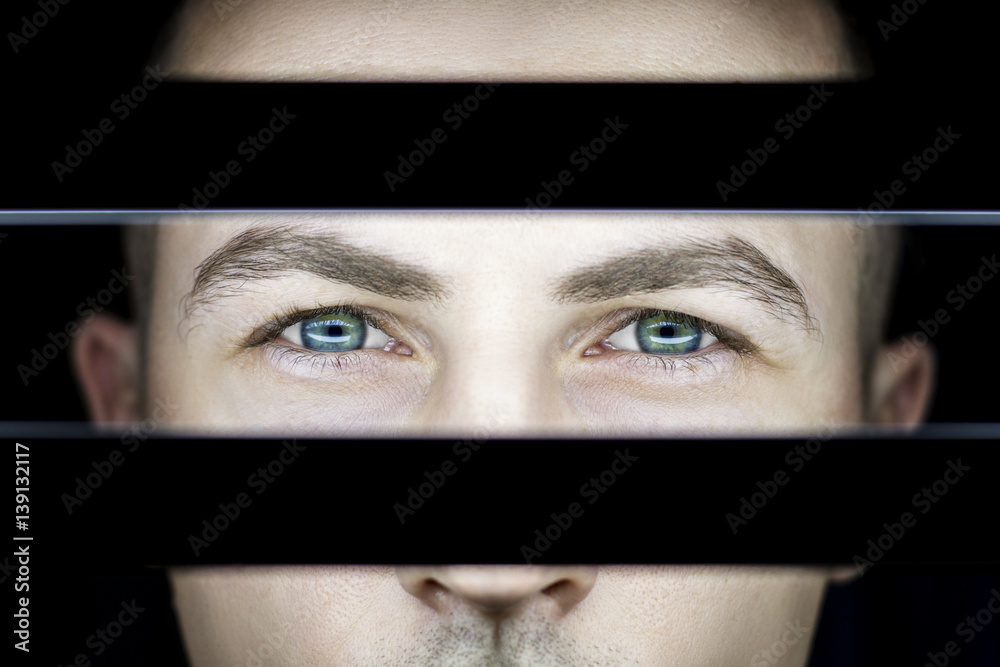 Portrait of a man in dark in light of lamps. Atmospheric art photo of a ...