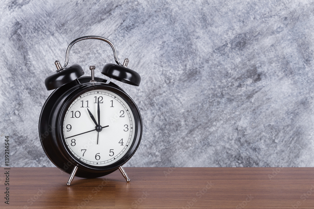 11 o'clock vintage clock on wood table and wall background Stock Photo ...