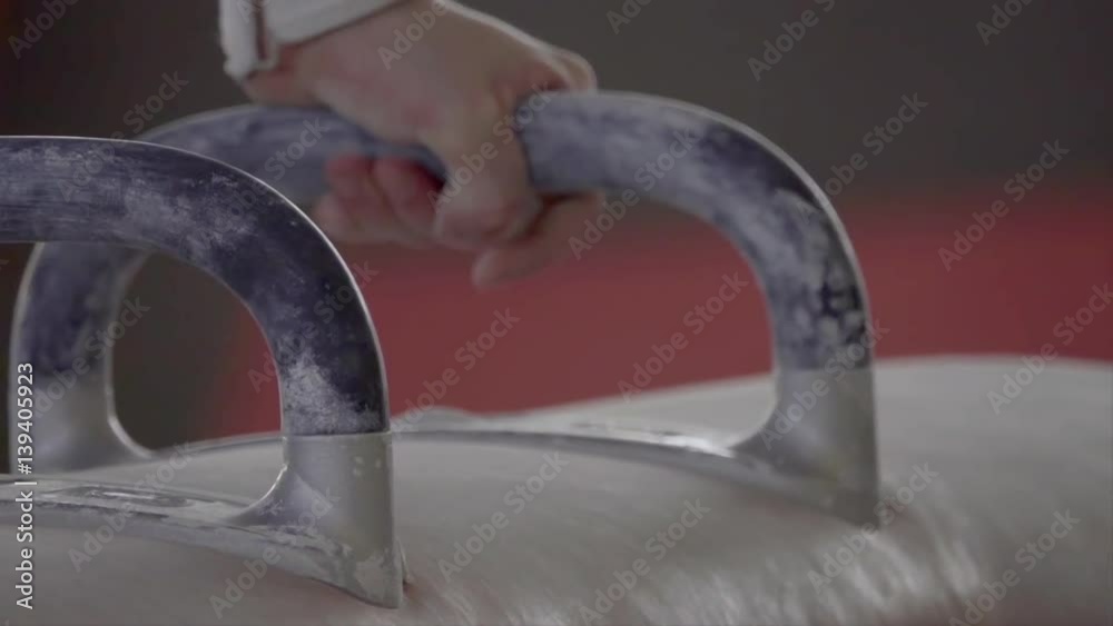 Gymnast doing routine exercises on pommel horse HD slow-motion video ...