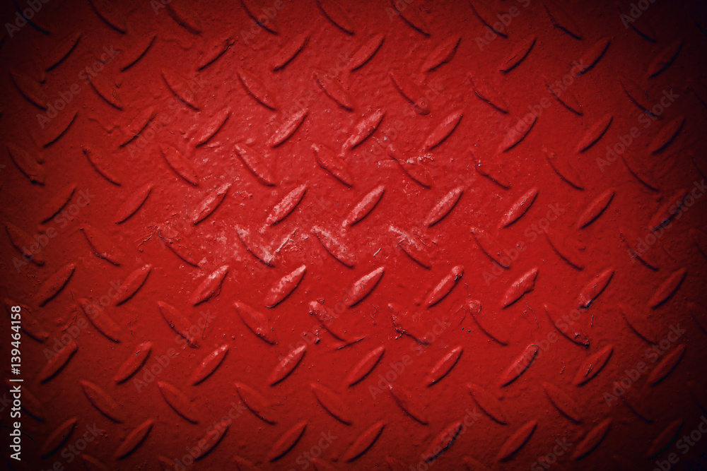 Red metal texture with a pattern in the form of lines and petals ...