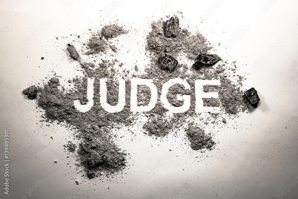 Word judge written in dirt, filth, ash, grime, dust as justice ...