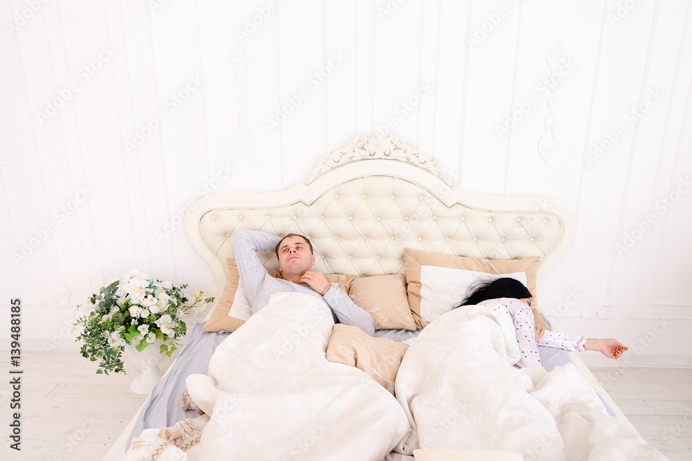 Man can not sleep in bed, thinking while wife sleep Stock-Foto | Adobe ...