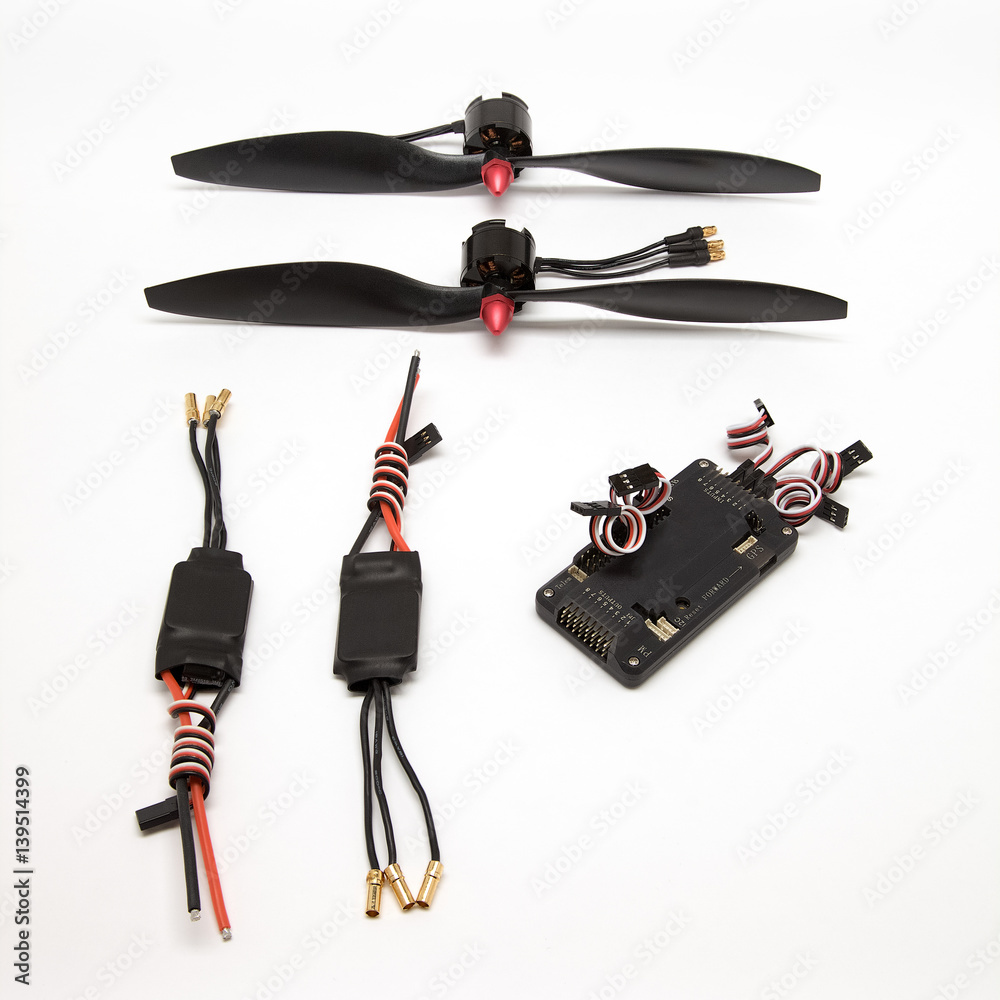 set of parts for assembly of the drone, closeup, on a white background ...