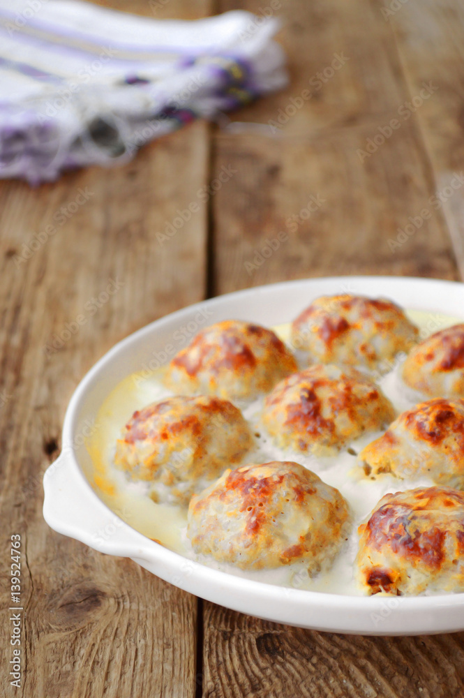 Meatballs in a white sauce. Food Photography. Wooden background. Stock ...