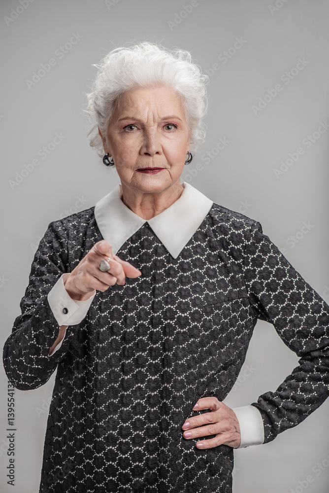 Angry mature woman gesturing seriously Stock Photo | Adobe Stock