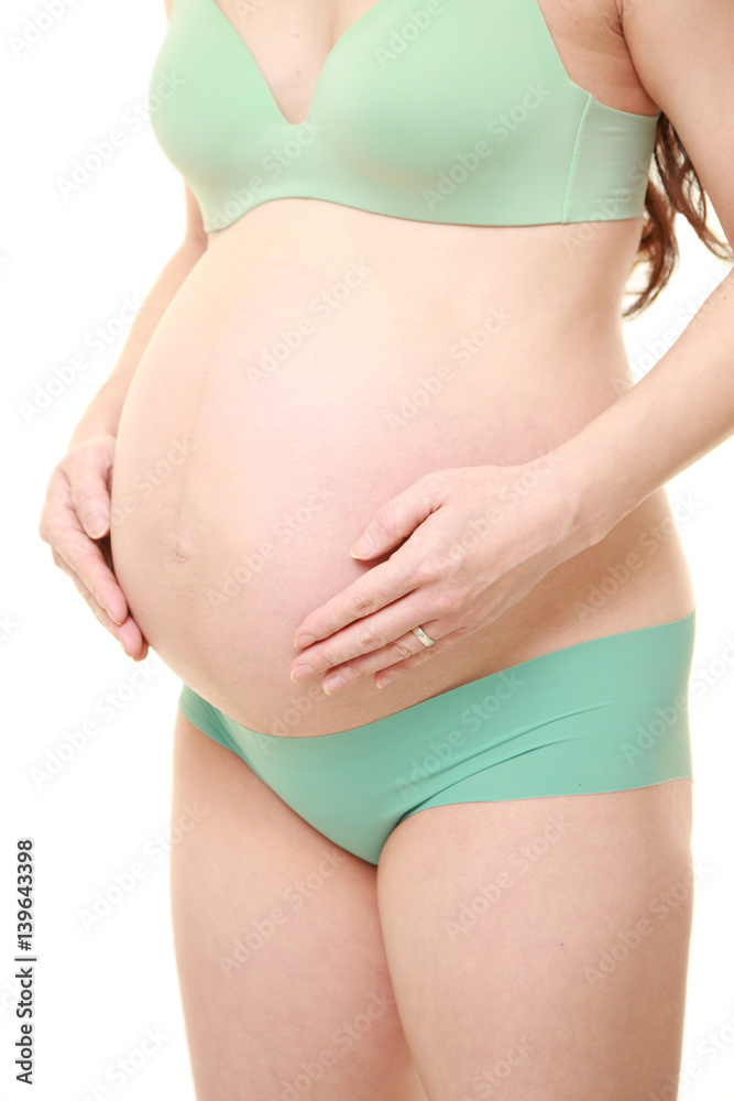 お腹を触る臨月の妊婦 Stock 写真 Adobe Stock