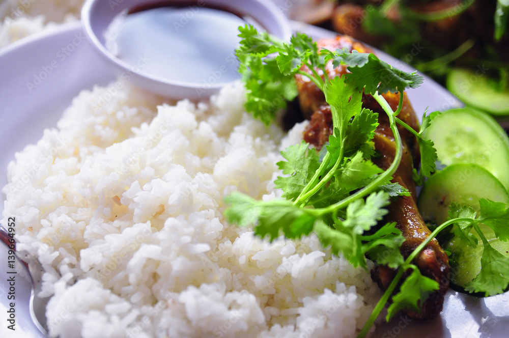 Vietnamese broken rice or com tam with fried chicken legs, pork and ...