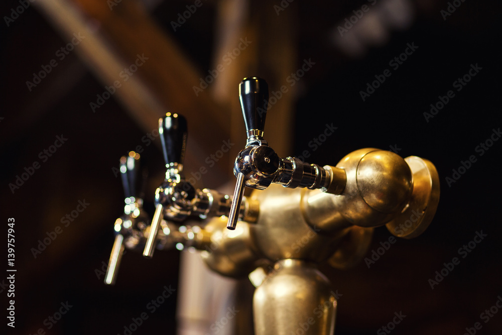 Foto Stock beer tap at the bar.A pub.Bar.Restaurant.Classic.Evening ...