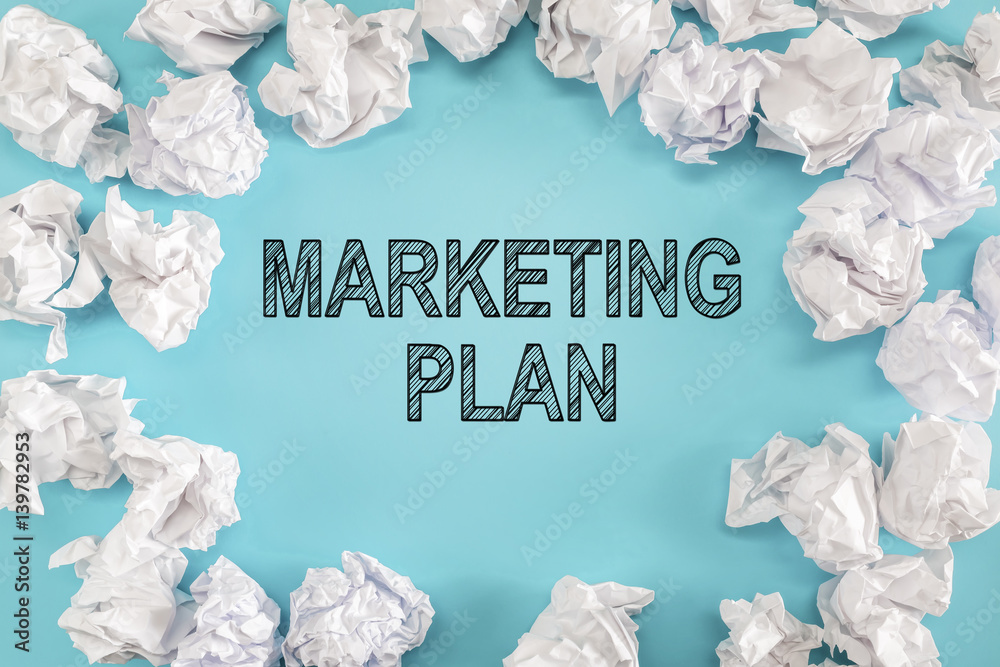 Marketing Plan text with crumpled paper balls Stock Photo | Adobe Stock