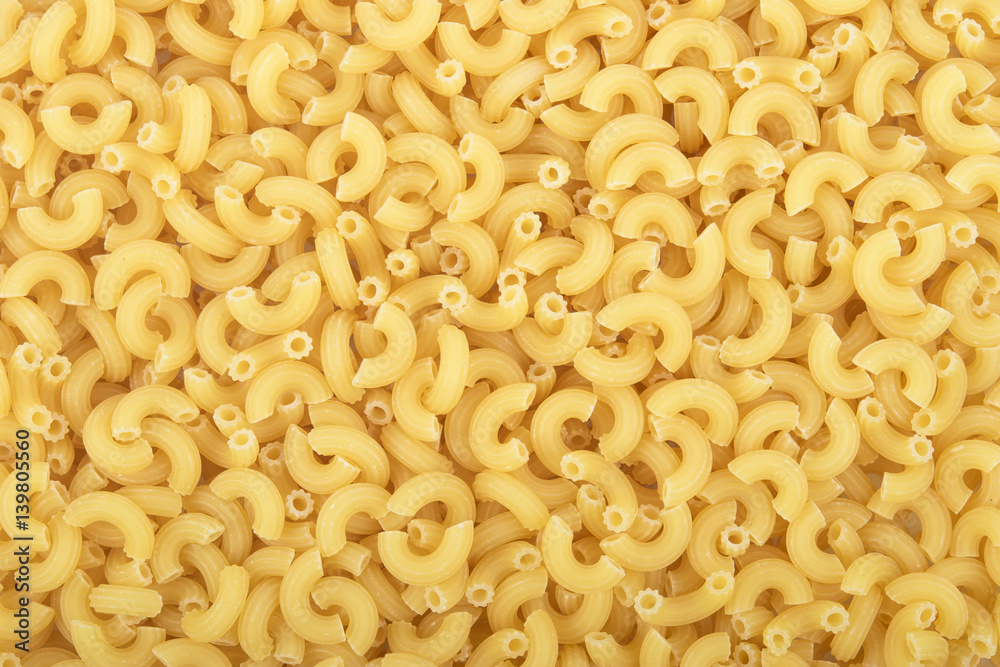 Full background of dry uncooked macaroni pasta Stock Photo | Adobe Stock