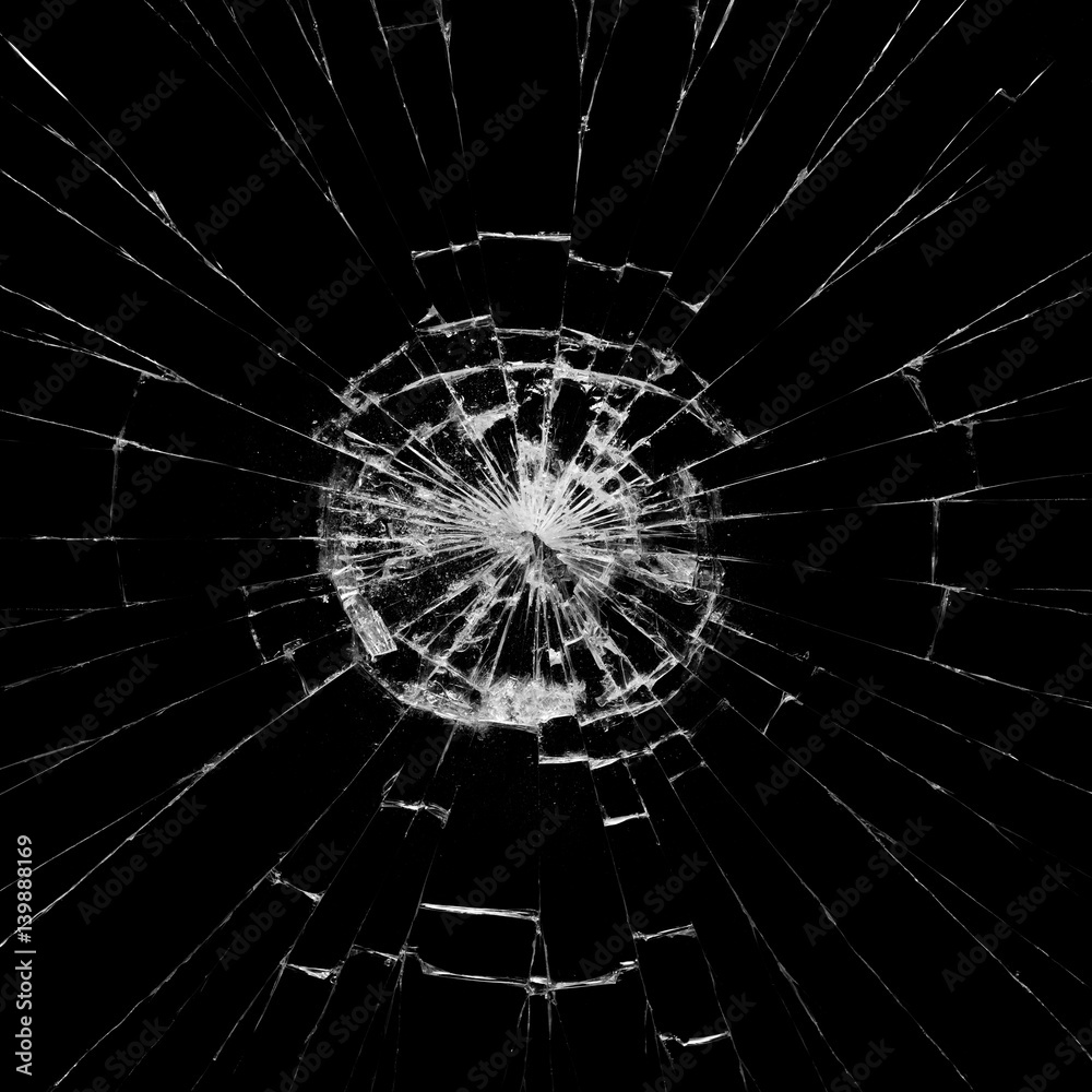 Broken glass on black background ,texture backdrop object design ...