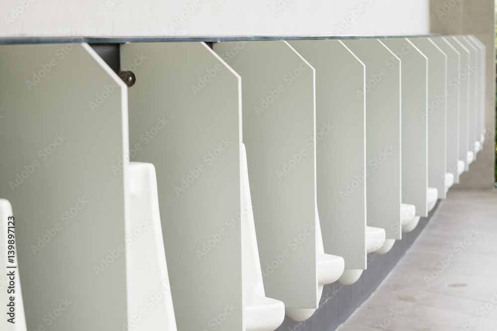 row of outdoor urinals men public toilet,Closeup white urinals in men's ...