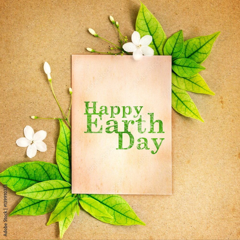 Happy Earth Day paper sheet with fresh spring green leafs border frame ...
