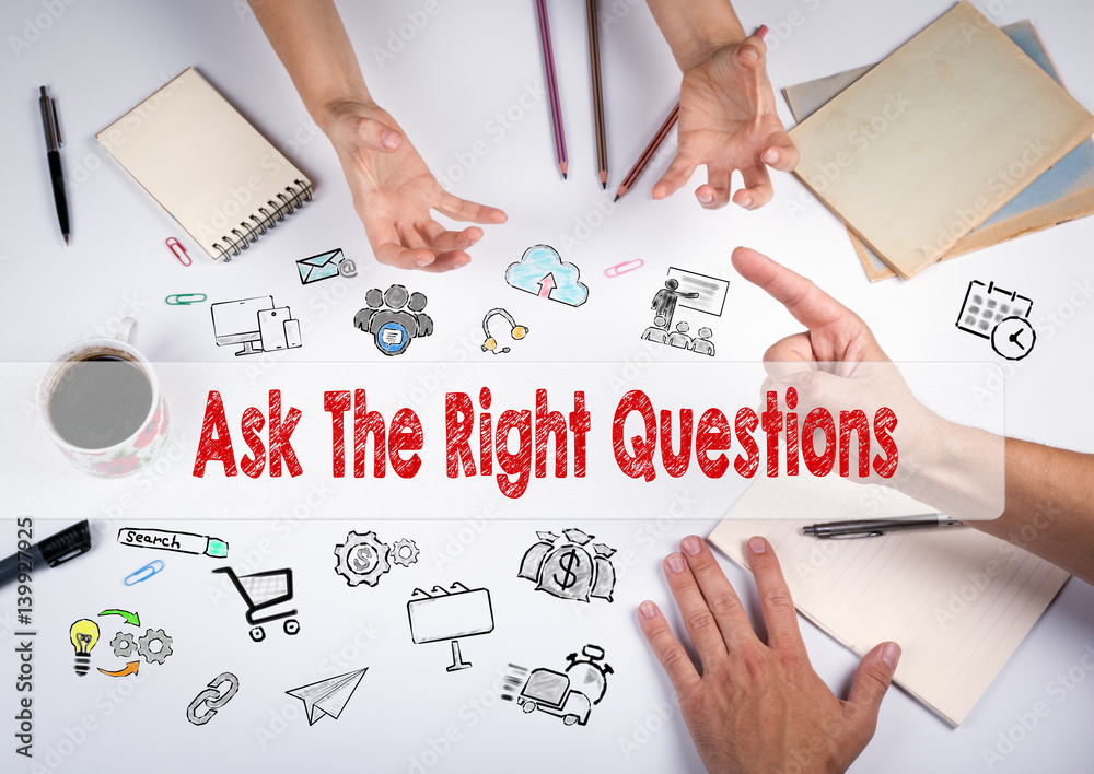 Ask The Right Questions concept. The meeting at the white office table ...