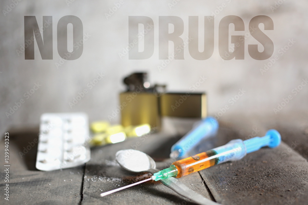 Sign No Drugs. Hard drugs on dark table. A dark theme, drug use. Stock ...