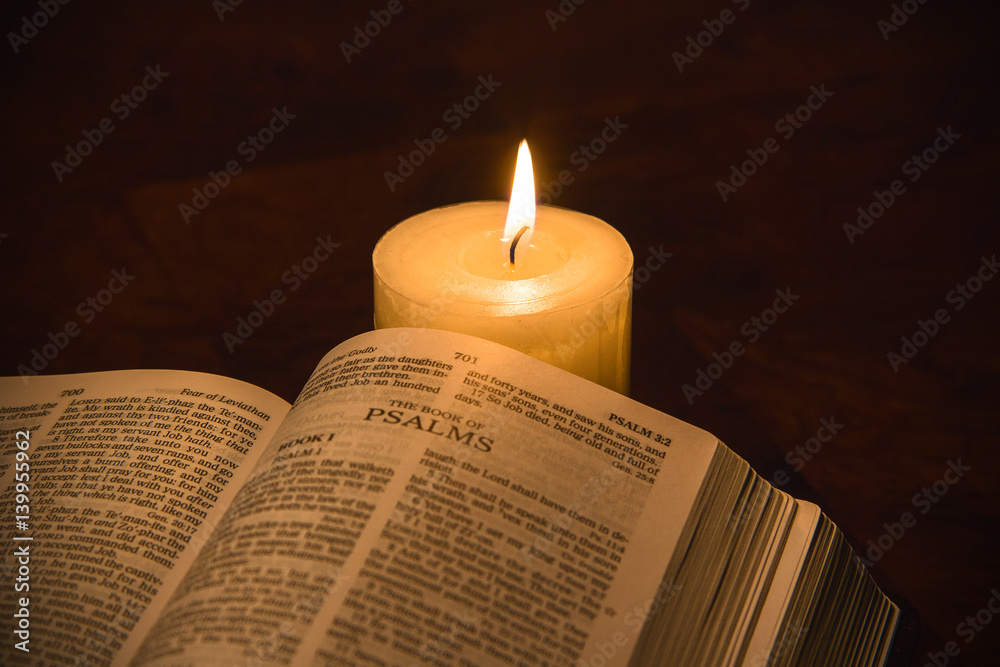 Open Bible and Candle Stock Photo | Adobe Stock